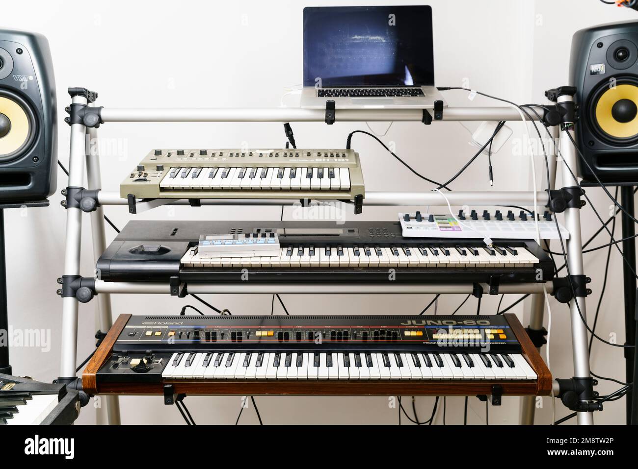 Keyboards and speakers in a music recording studio in Bruton, Somerset ...