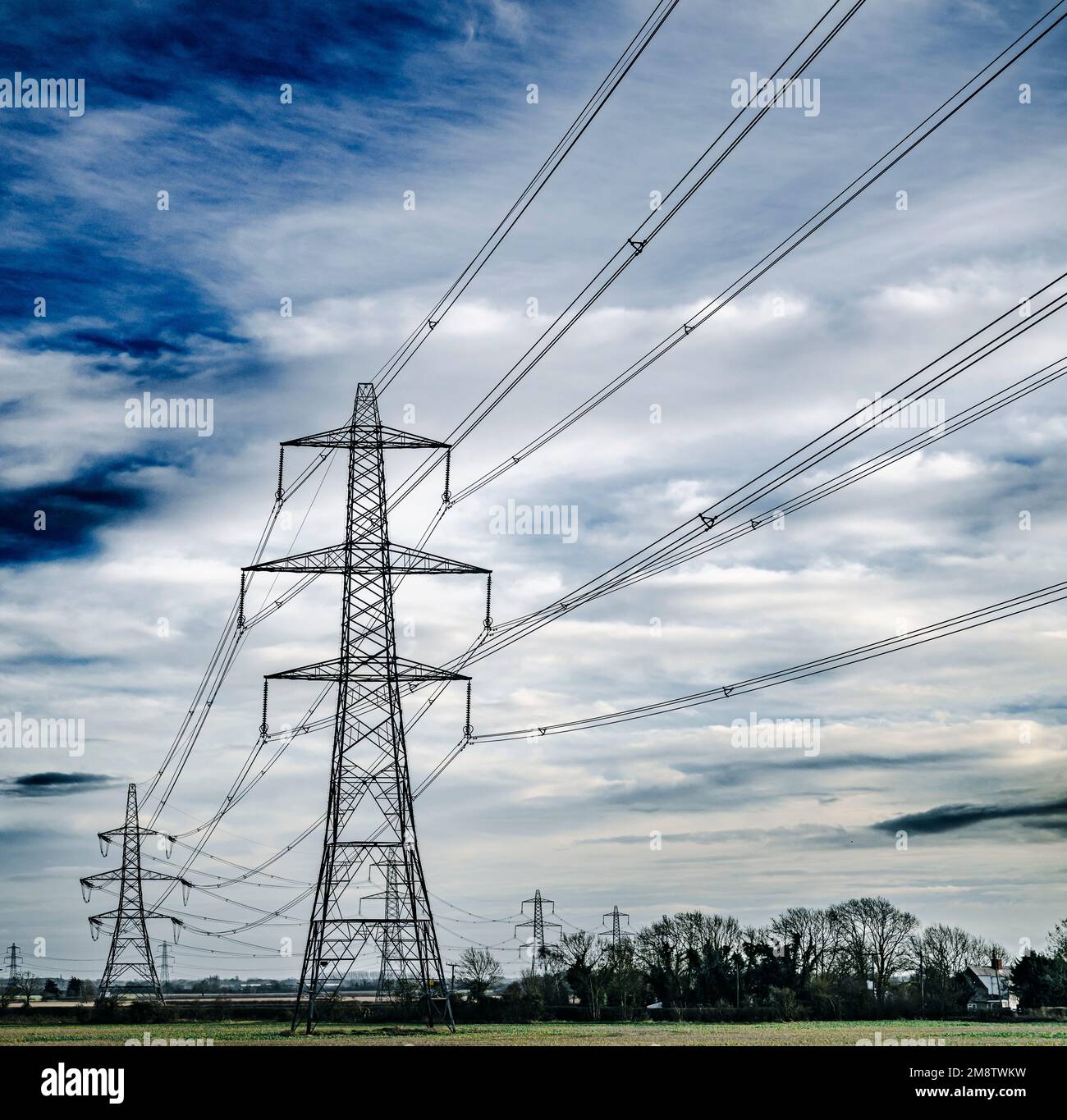 Lincolnshire, England UK - Electricity pylons running across farmland ...