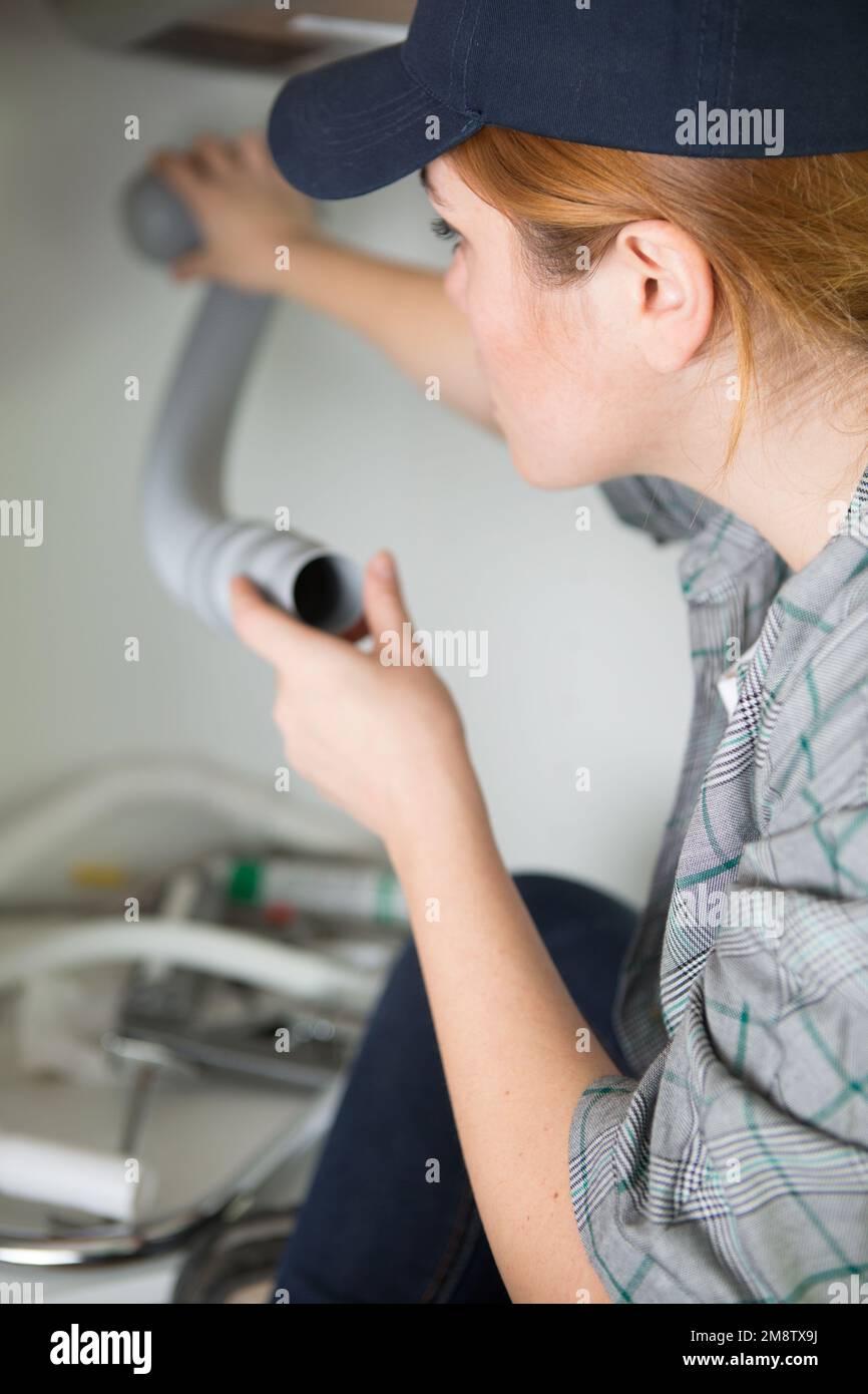 Professional plumber fixing piping hi-res stock photography and images ...