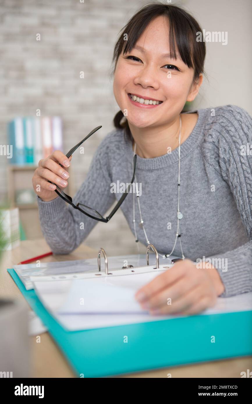 Adult asian doing college work hi-res stock photography and images - Alamy