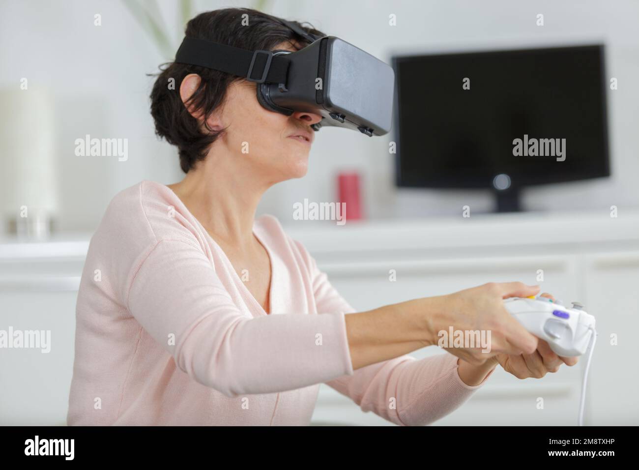 Teenage girl control gaming hi-res stock photography and images - Alamy
