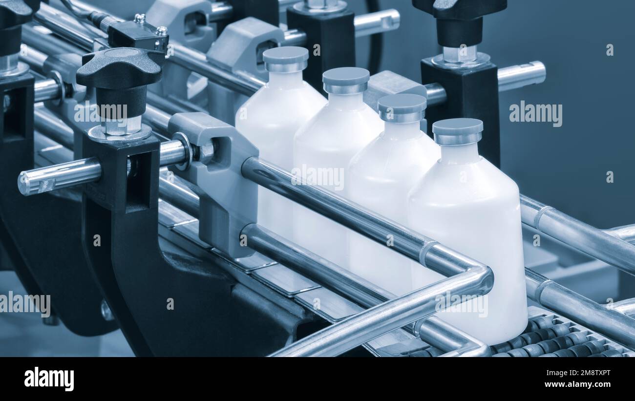 pharmaceutical industry, medicine pills are filling in the bottle on ...