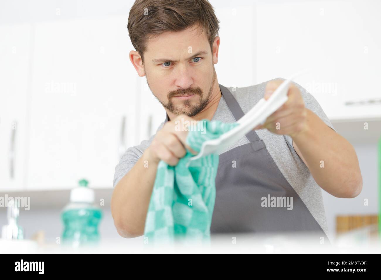 Dish polishing hi-res stock photography and images - Alamy