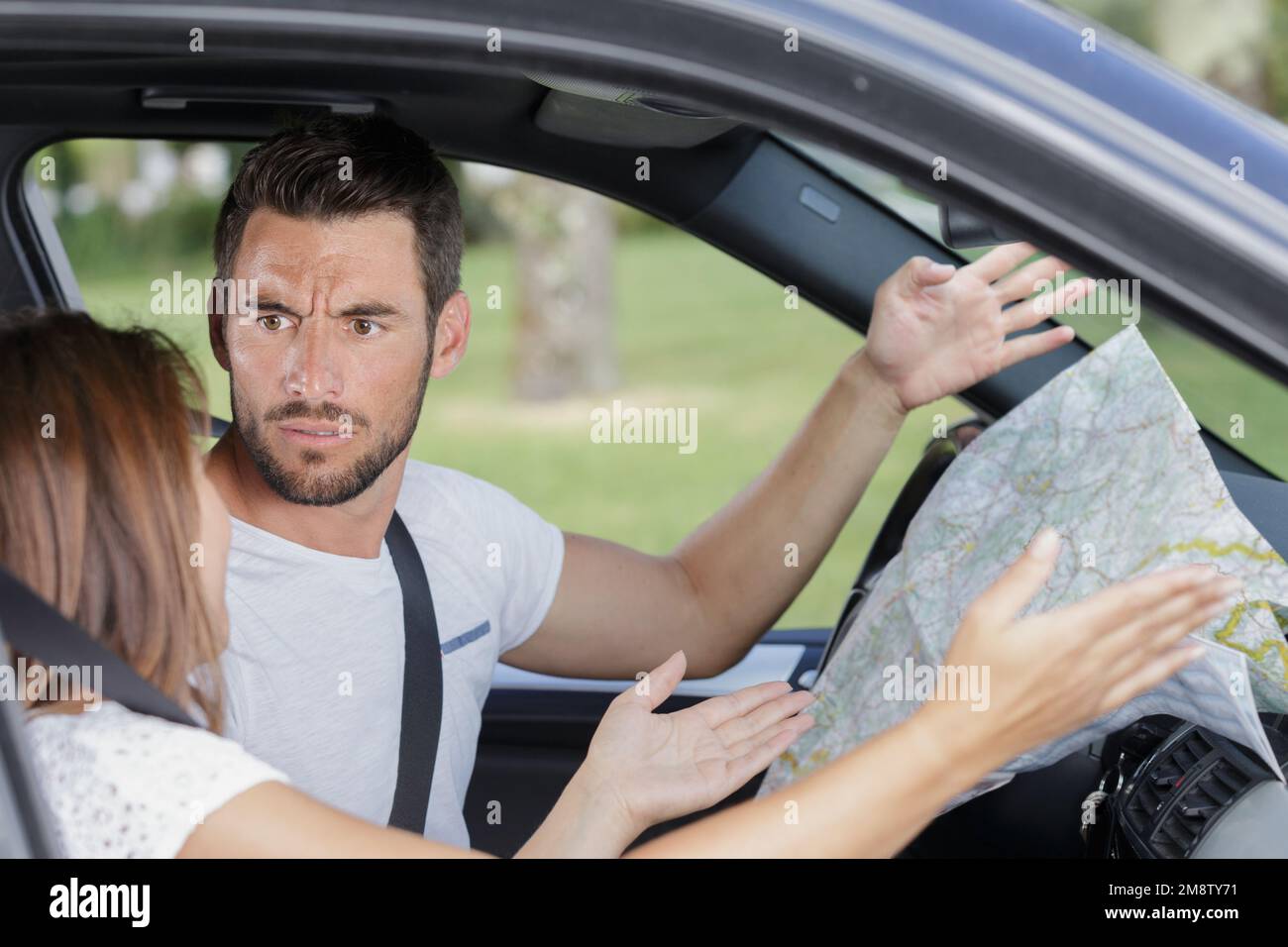couple having a serious talk in a car Stock Photo - Alamy