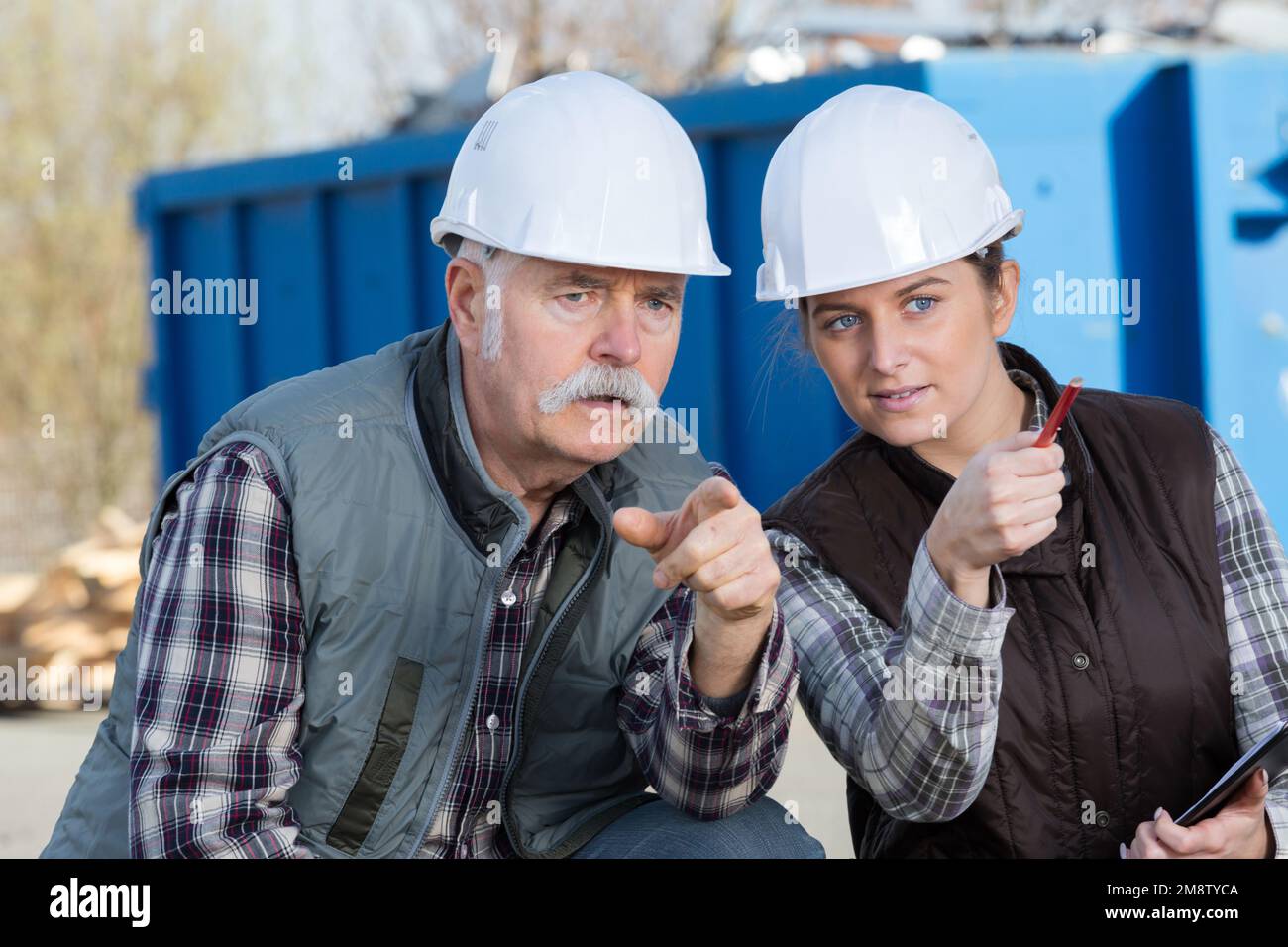 environmental workers thinking of a plan Stock Photo - Alamy