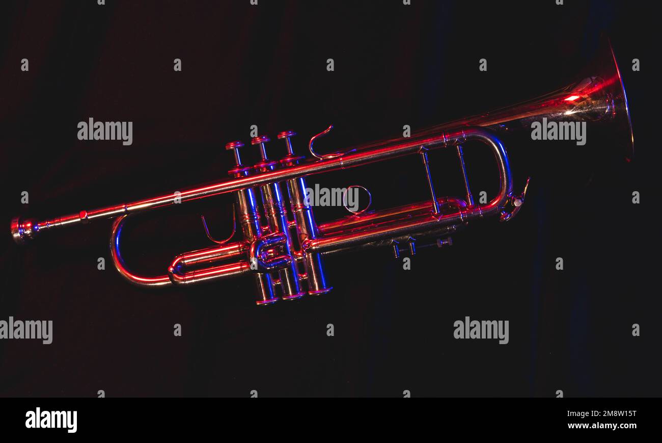 Trumpet in the Dark Stock Photo - Alamy