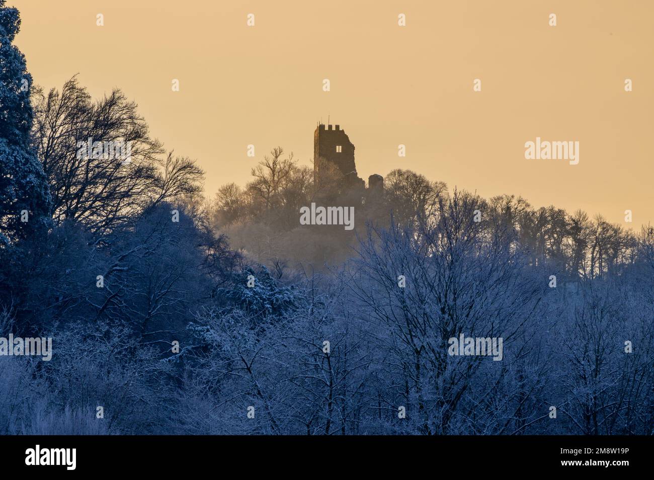 Ruin of Drachenfels or Dragons Rock at sunrise in winter with ice ...