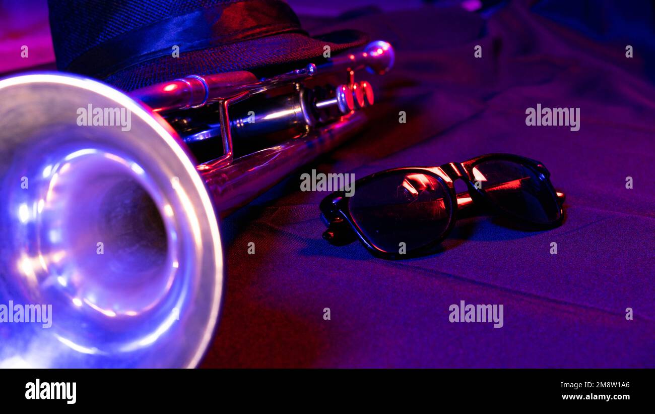 Trumpet with hat and sunglasses Stock Photo - Alamy