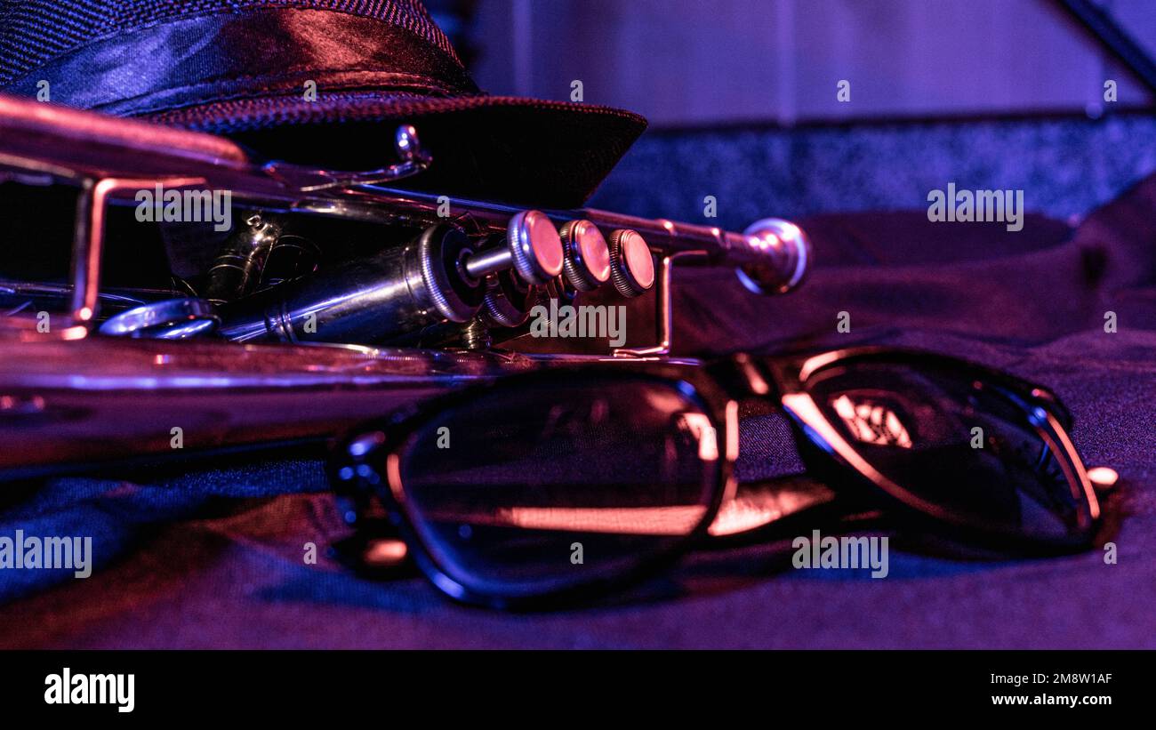 Trumpet with hat and sunglasses Stock Photo - Alamy