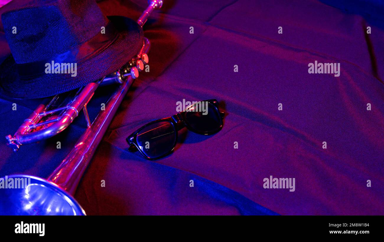 Trumpet with hat and sunglasses Stock Photo - Alamy