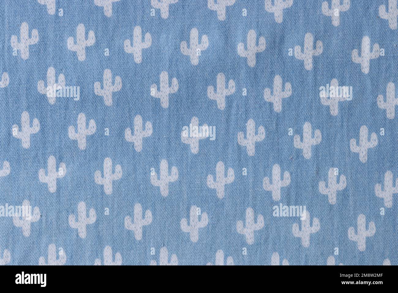 Blue and white fabric with cactus plant pattern Stock Photo - Alamy
