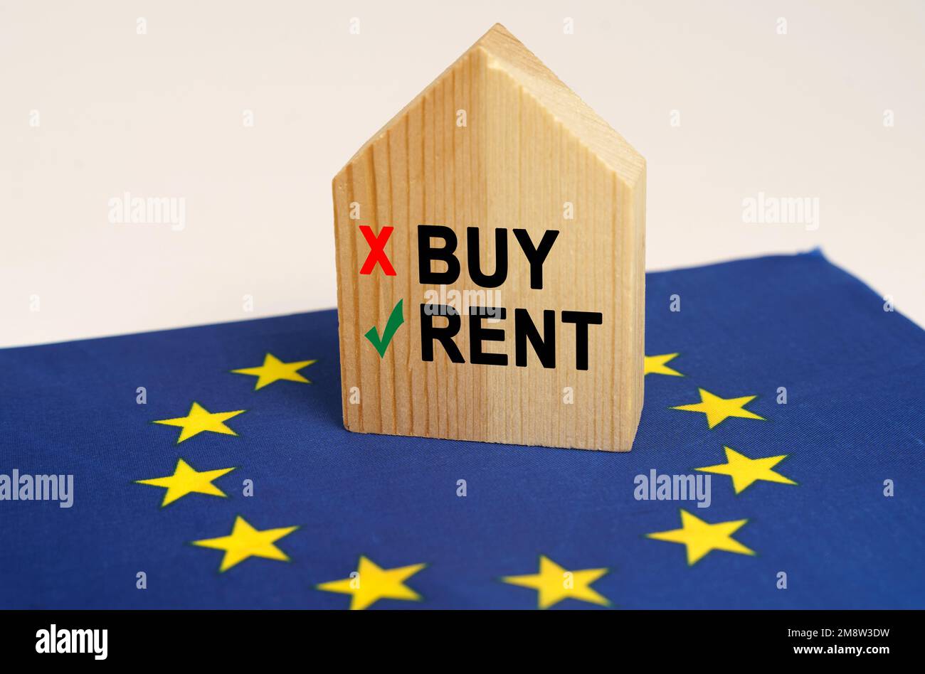 Real estate concept. On the flag of the European Union there is a model ...