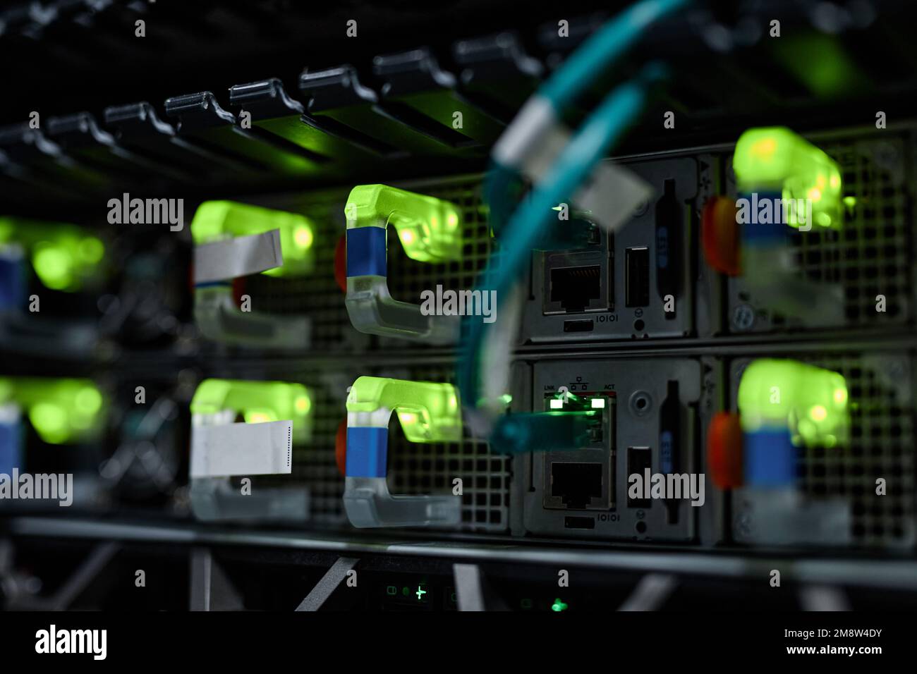 Close up background image of neon indicator lights in server cabinet ...