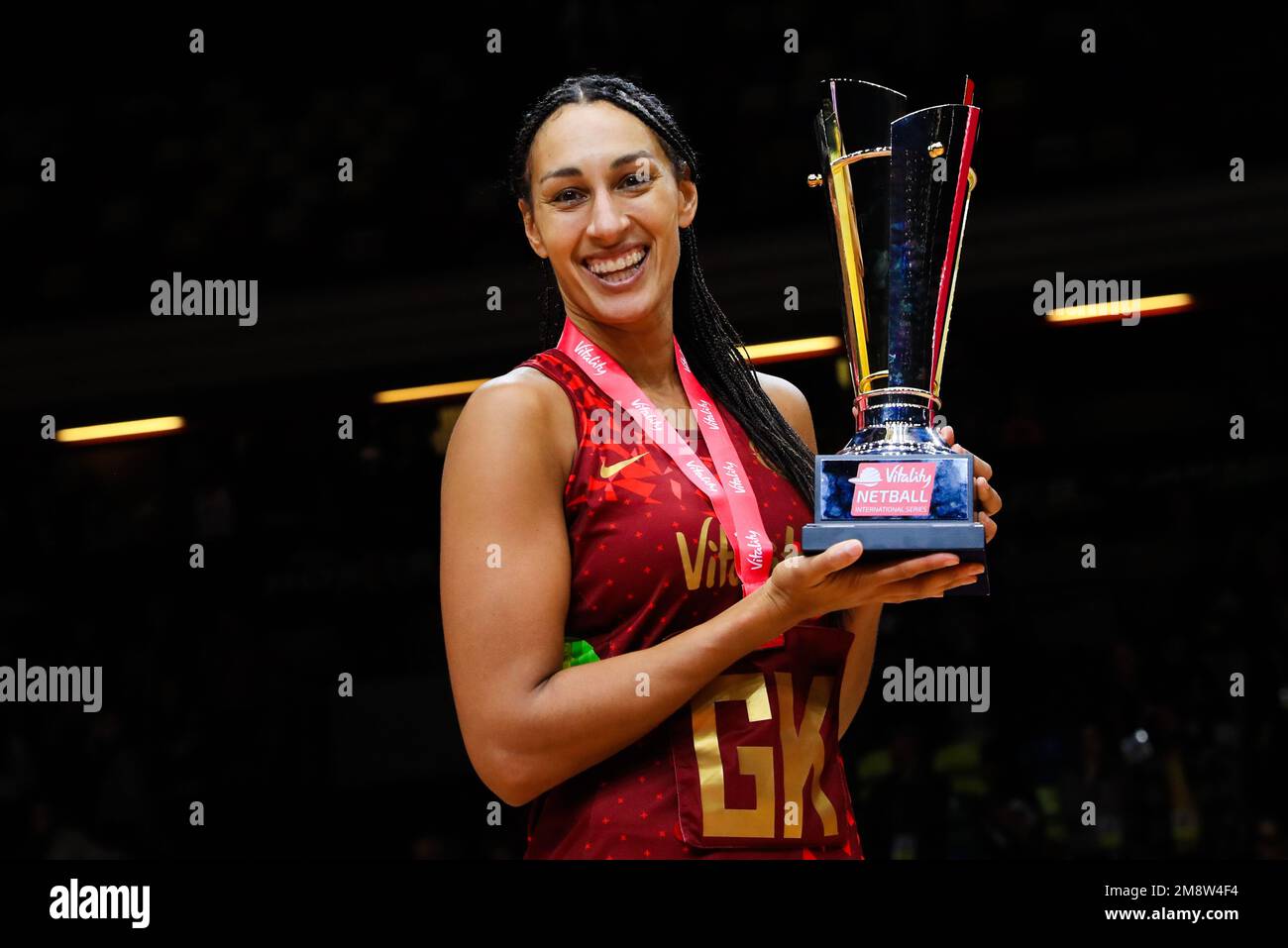 England’s Geva Mentor poses with their trophy after winning the ...