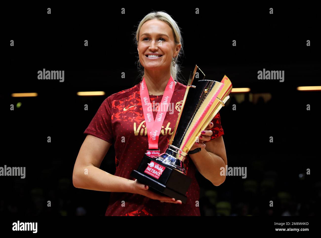England’s Chelsea Pitman poses with their trophy after winning the ...