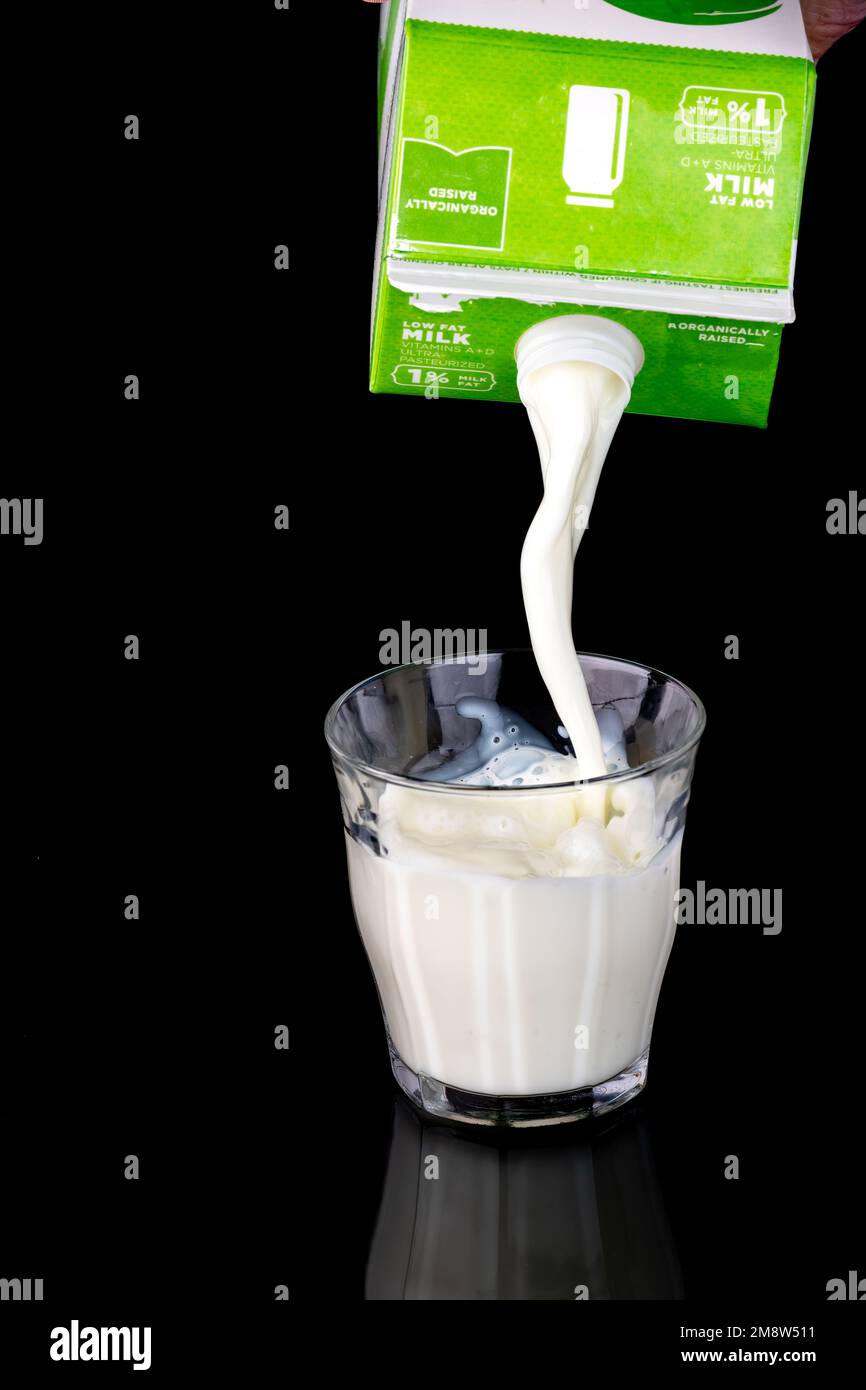 Pouring milk carton hi-res stock photography and images - Alamy