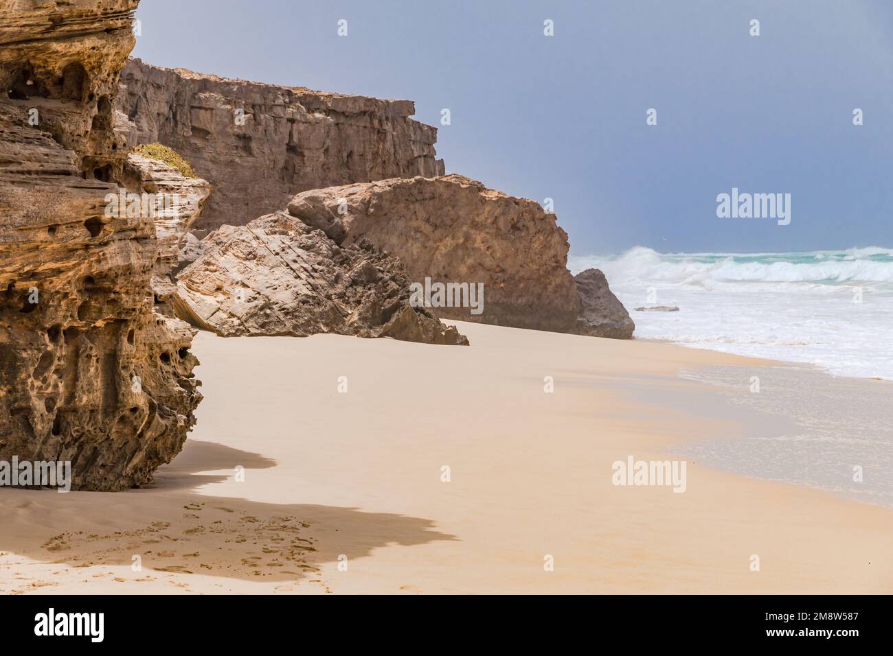 Rock formation at Praia da Varandinha beach on the southwest coast of ...
