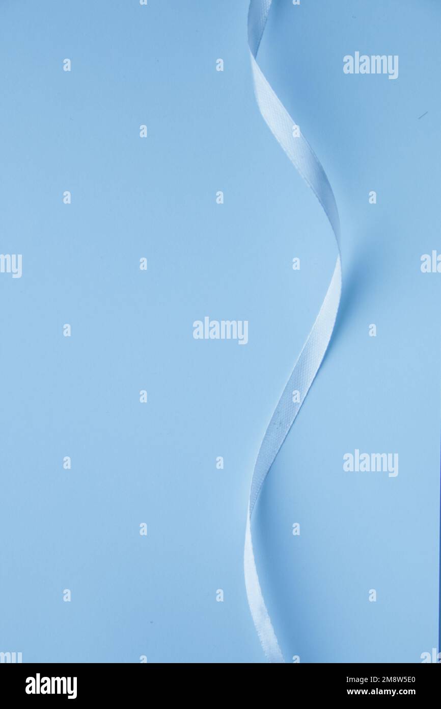 Blue background. Blue ribbon on a blue background. Background for a ...