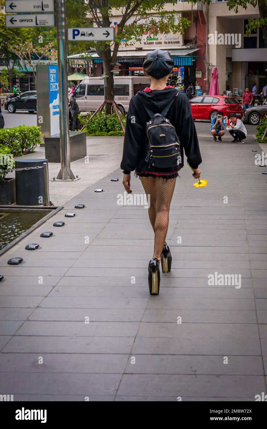 Back of a model walking away on high heels in Ho Chi Minh Vietnam Stock ...