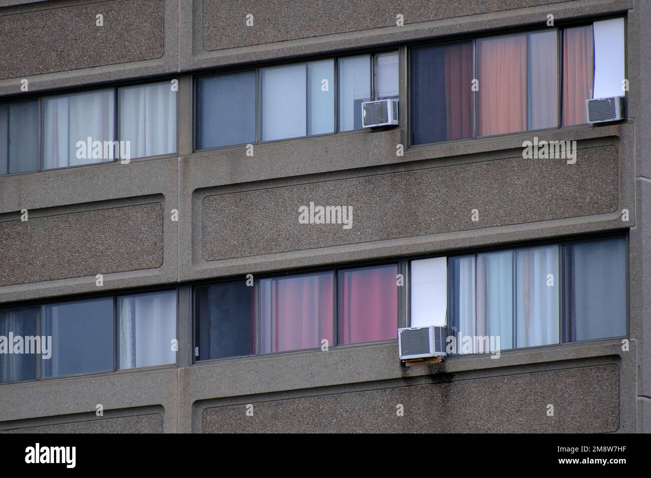 The windows closed with curtains on the modern building Stock Photo - Alamy
