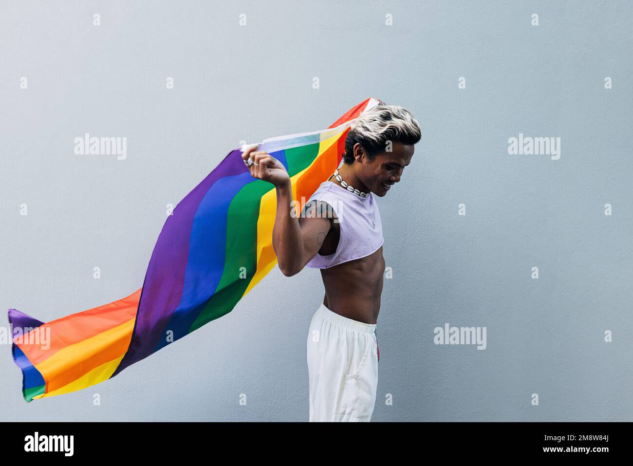 Man walking with pride flag hi-res stock photography and images - Alamy