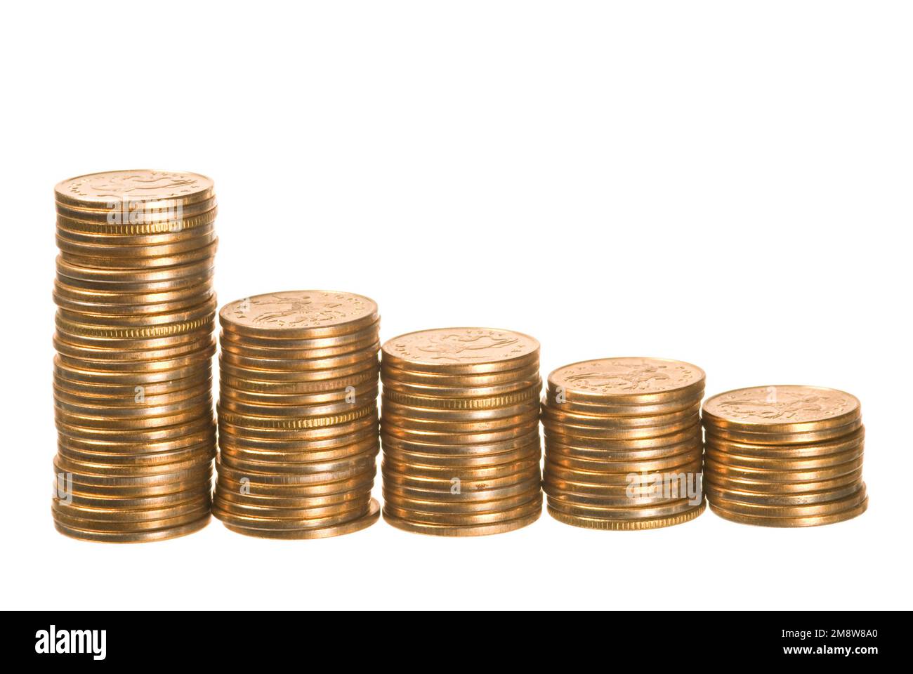 Stacks of yellow coins on white Stock Photo - Alamy