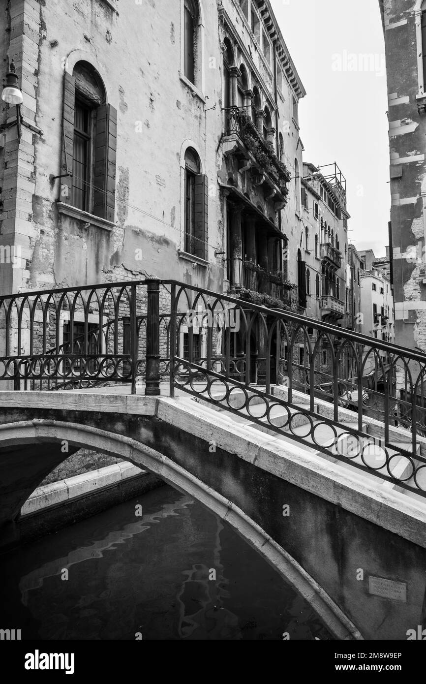 Bridge over canals in Venice, off the beaten track Stock Photo - Alamy