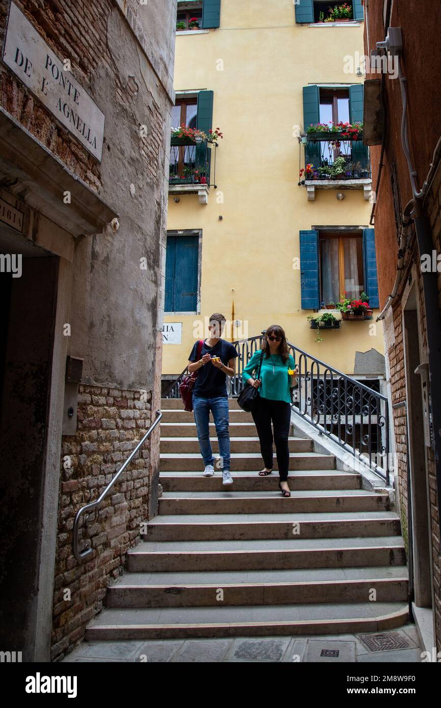 Bridge over canals in Venice, off the beaten track Stock Photo - Alamy