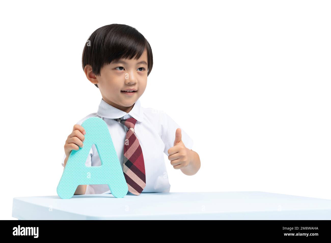 The little boy in learning Stock Photo - Alamy