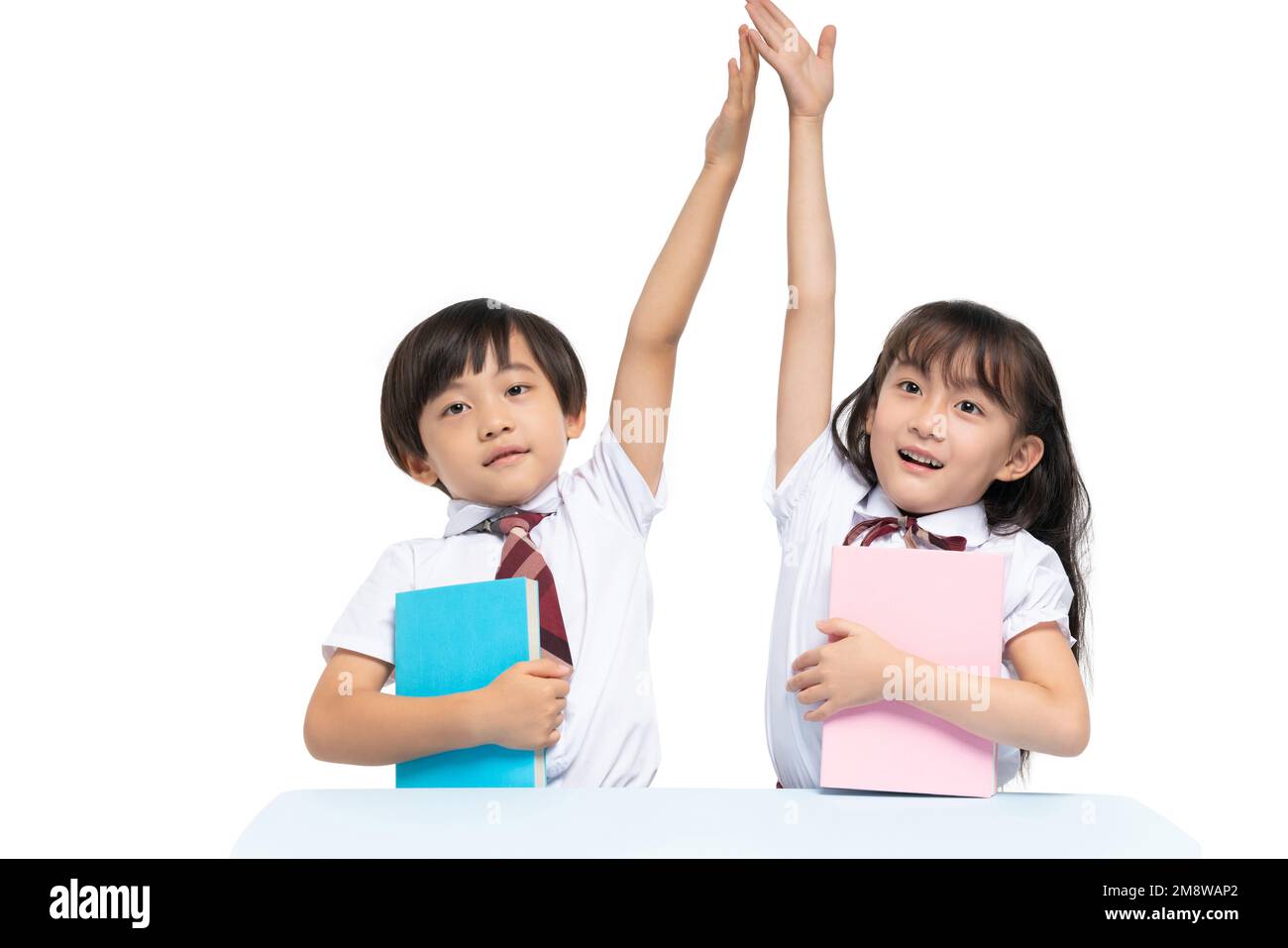 The little boy and little girl in the study Stock Photo - Alamy