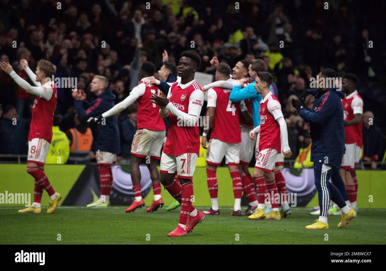 London, UK. 15th Jan, 2023. Bukayo Saka of Arsenal (c) celebrates with ...