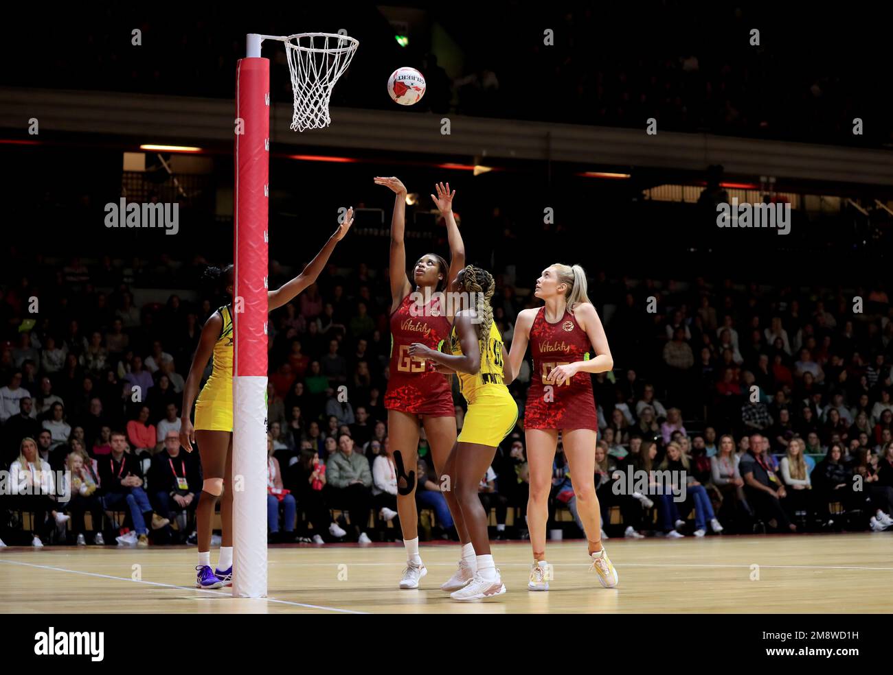 England’s Olivia Tchine scores during the Vitality Netball ...