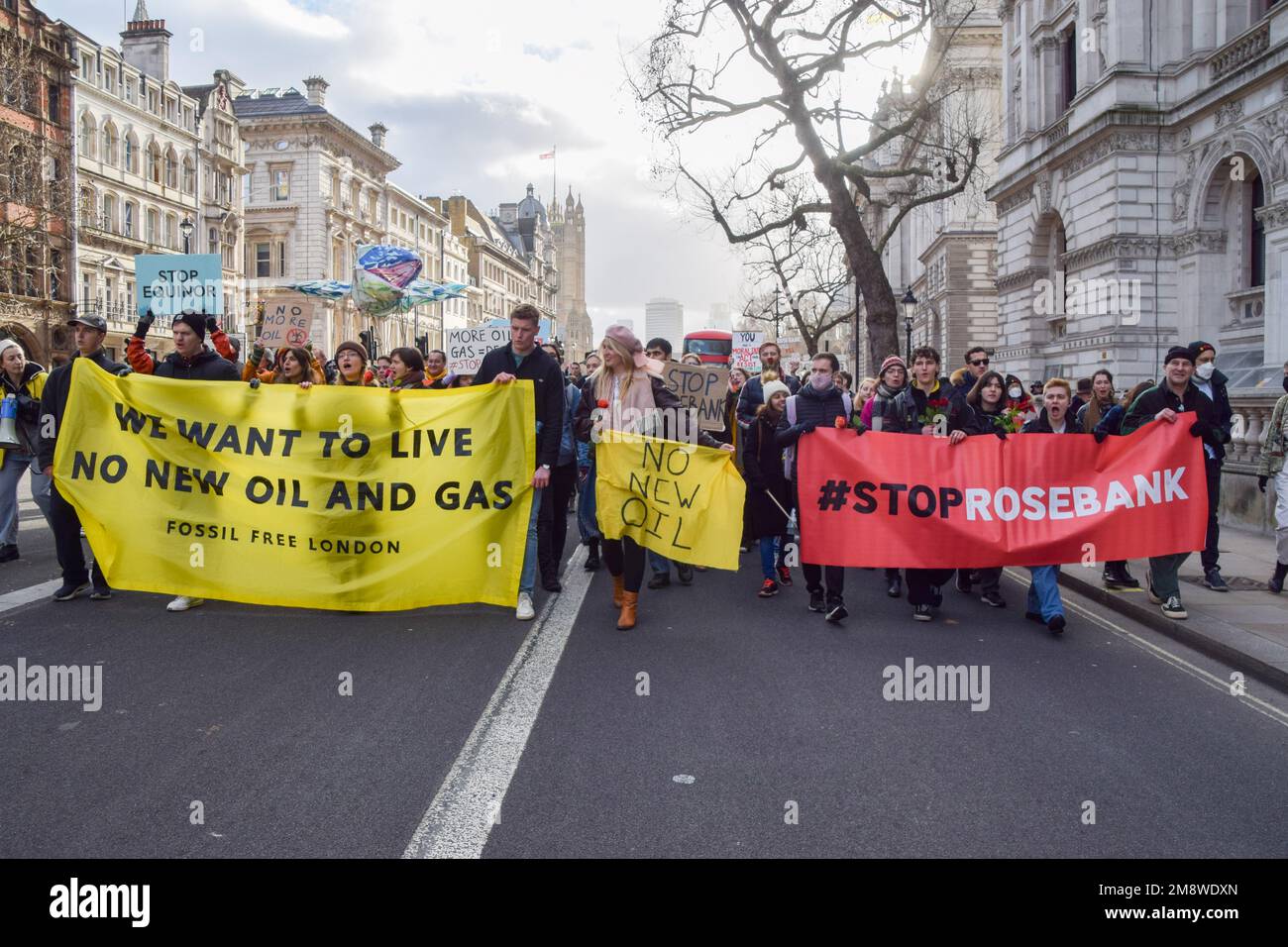 London, UK. 15th Jan, 2023. Protesters march with anti-fossil fuel ...