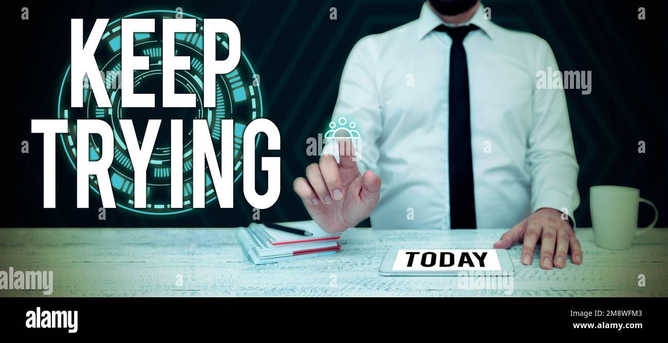 Conceptual caption Keep Trying. Word Written on continue to do ...