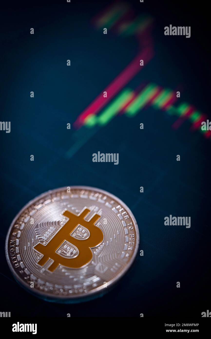 Silver Bitcoin cryptocurrency with candle stick graph chart and digital ...