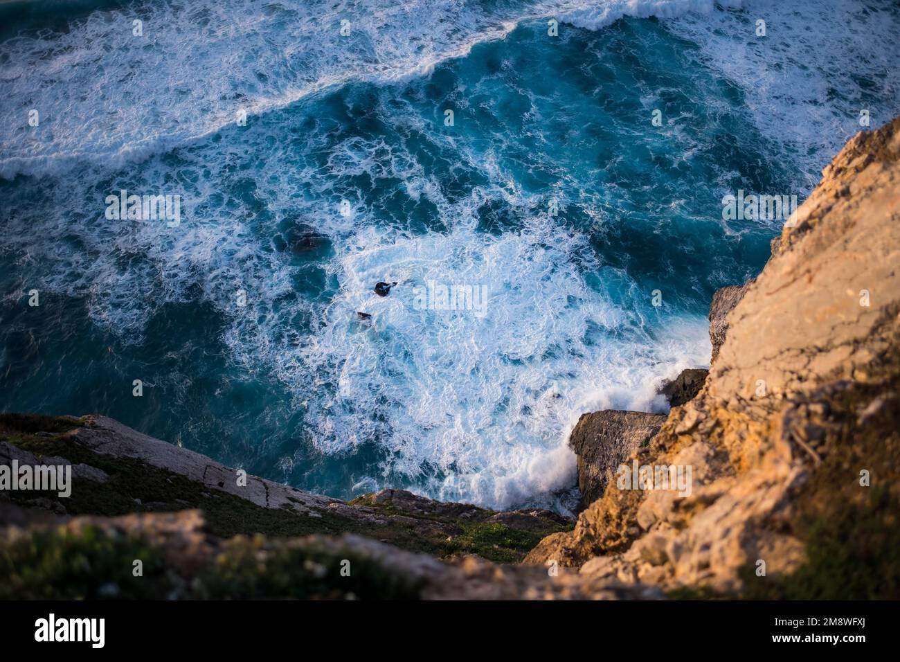 View of the ocean surf on the Atlantic coast from the cliffs, Cabo da ...