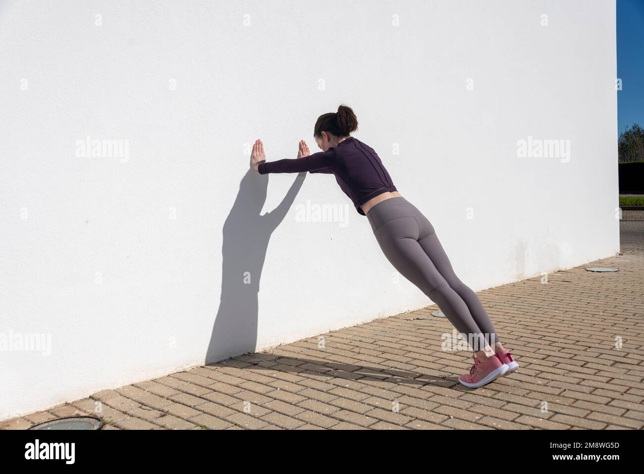 Wall push up exercise hi-res stock photography and images - Alamy