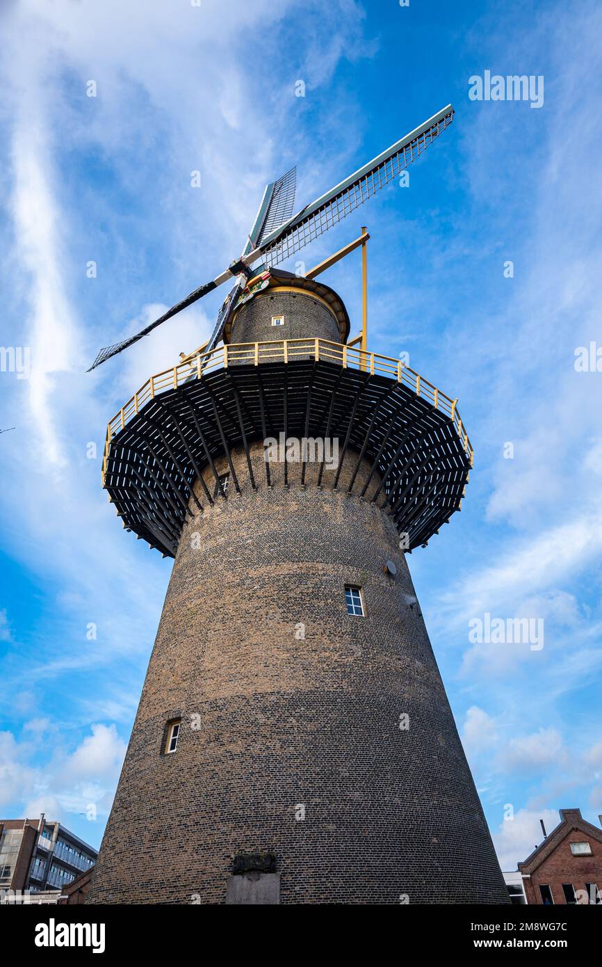 Low angle view of the tall traditional Dutch windmill "De Noord" in the ...