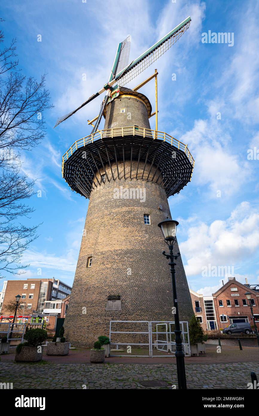 Tall traditional Dutch windmill "De Noord" in the historic city of ...