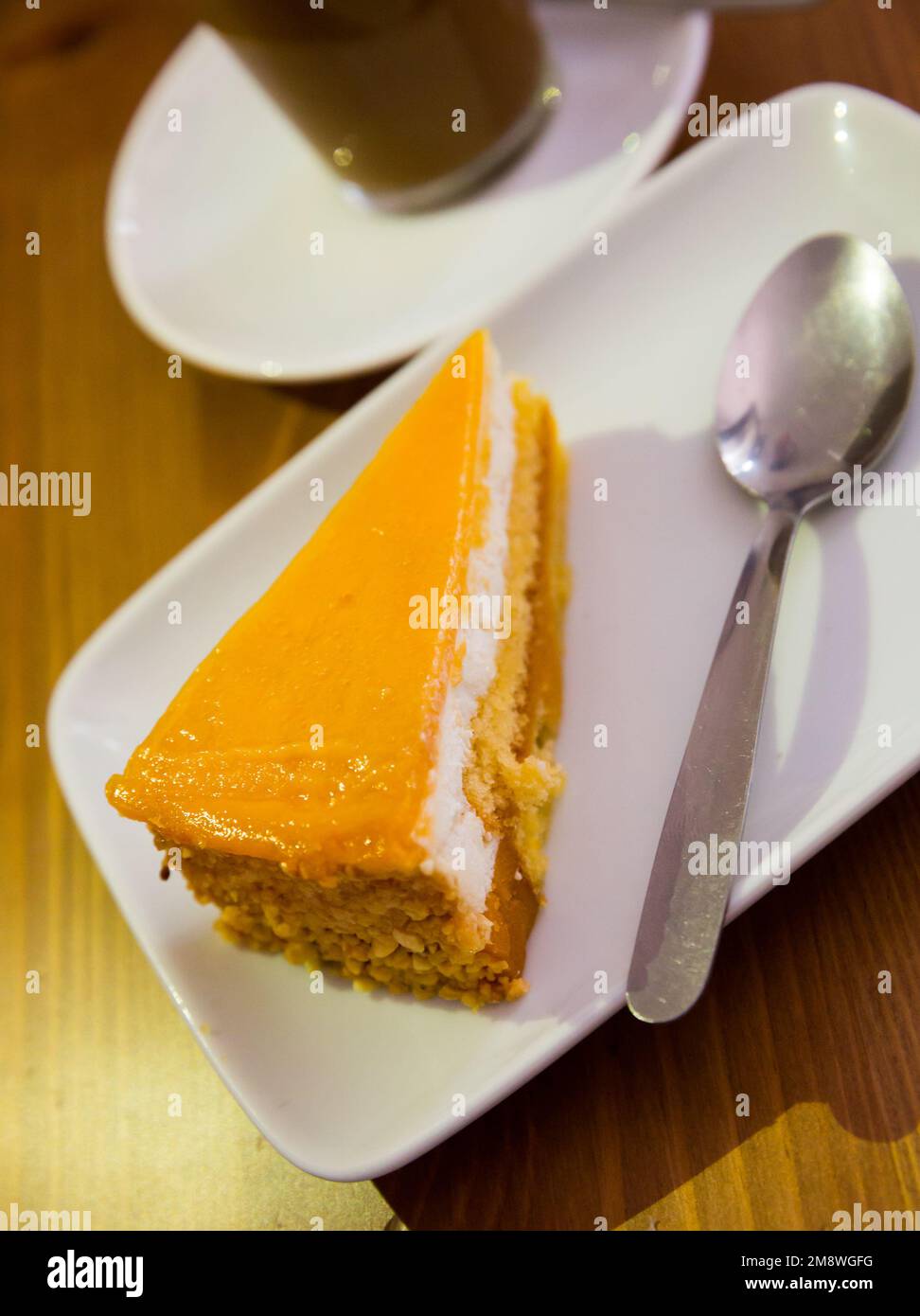 Slice of creamy mousse cheesecake Stock Photo - Alamy