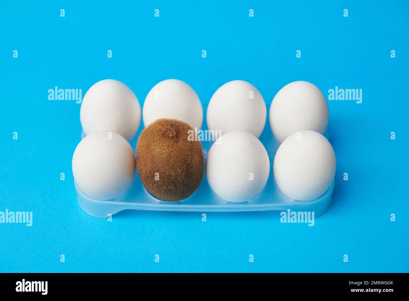 Hairy kiwi among smooth eggs, male depilation concept Stock Photo - Alamy