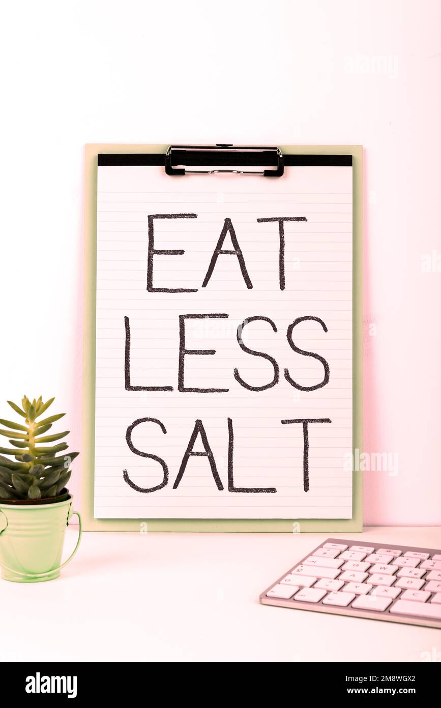 Conceptual display Eat Less Salt. Internet Concept reducing the sodium ...