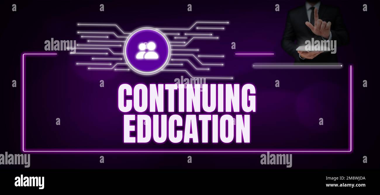 Hand writing sign Continuing Education. Business approach Continued ...