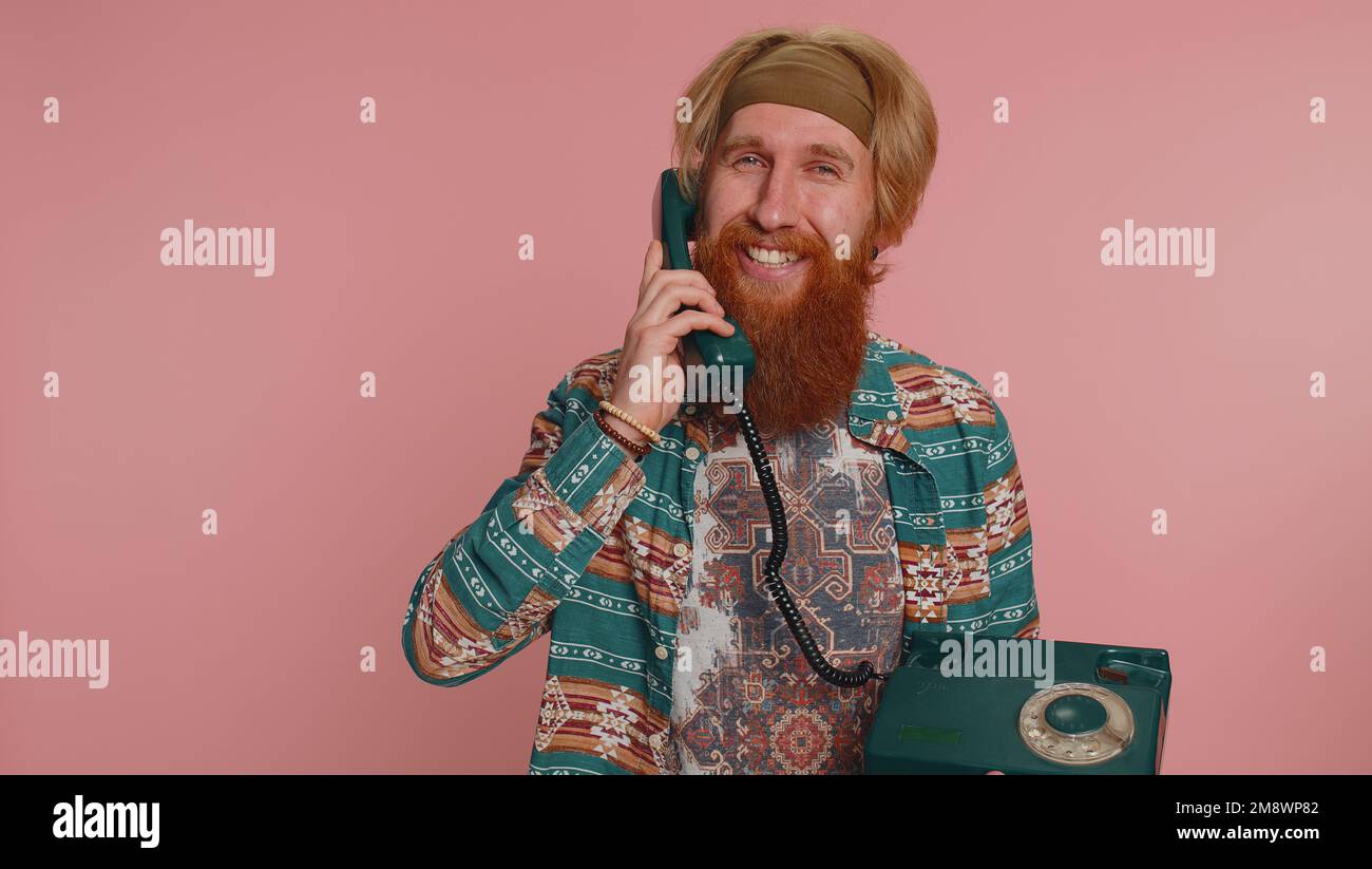 Hey you, call me back. Hippie redhead bearded man in pattern shirt ...