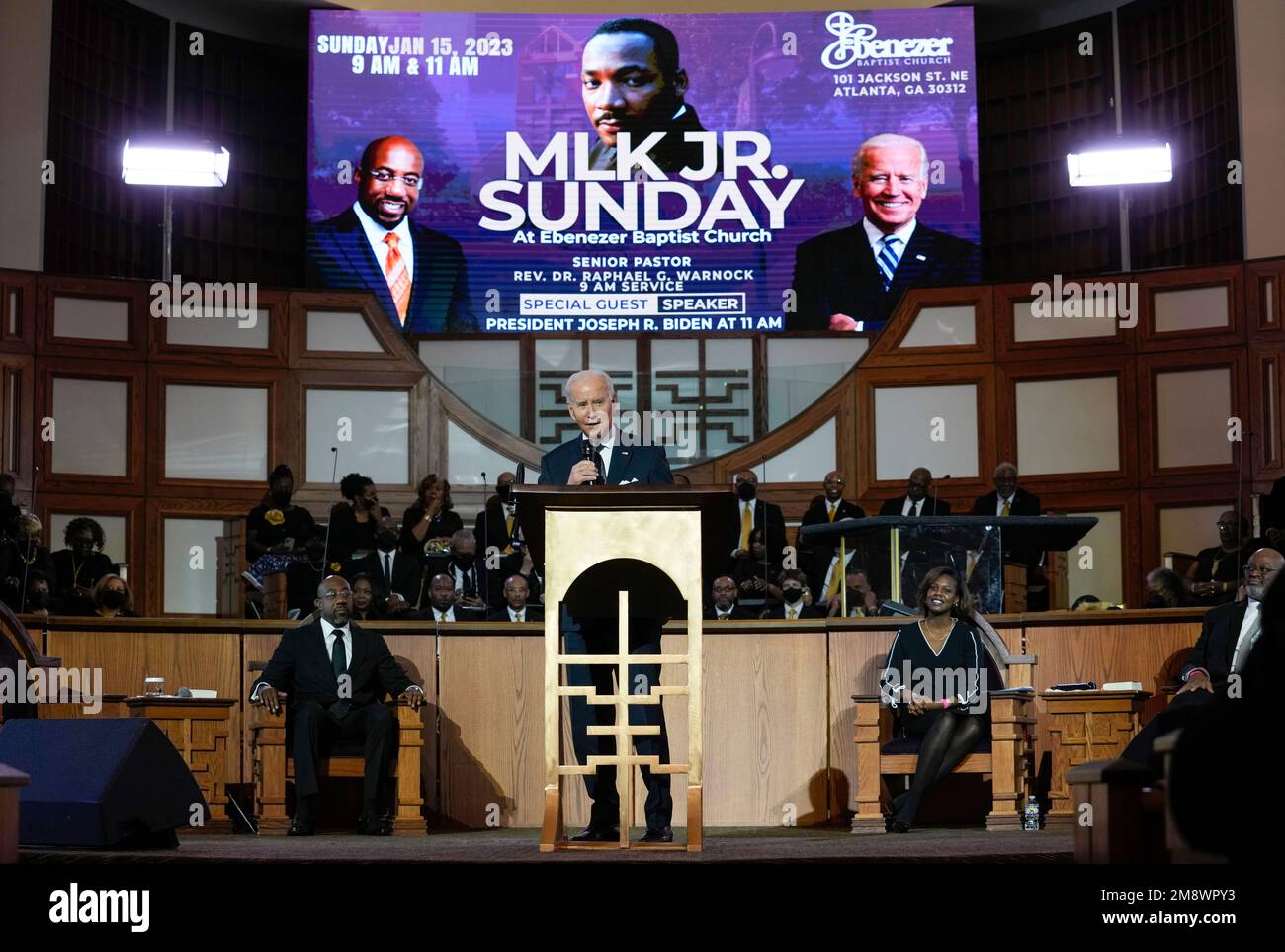 President Joe Biden, joined by Sen. Raphael Warnock, D-Ga., left, and ...