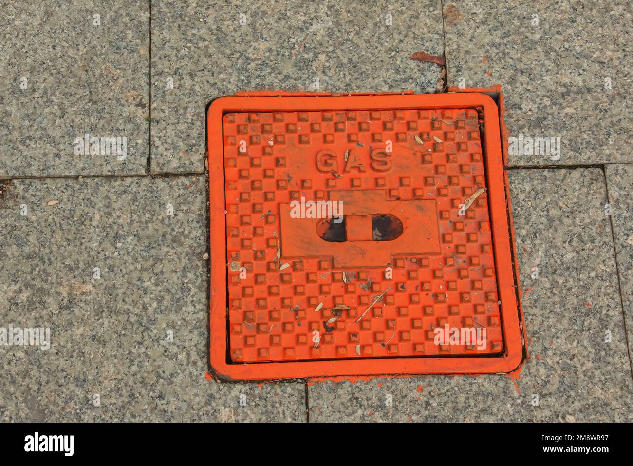 Manhole cover of the gas pipeline system. A massive metal hatch for ...