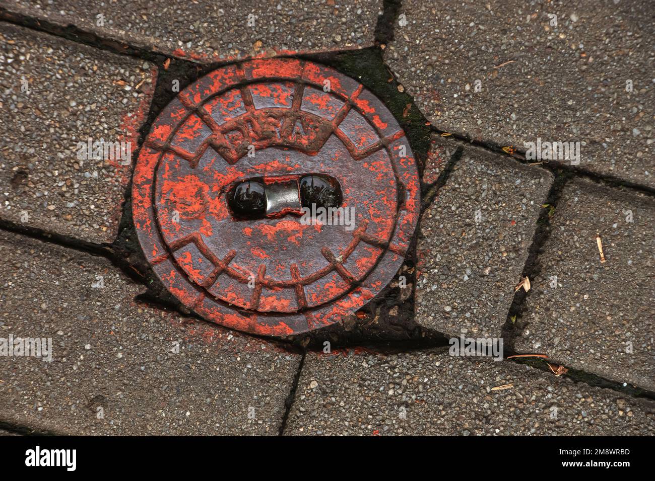 Manhole cover of the gas pipeline system. A massive metal hatch for ...