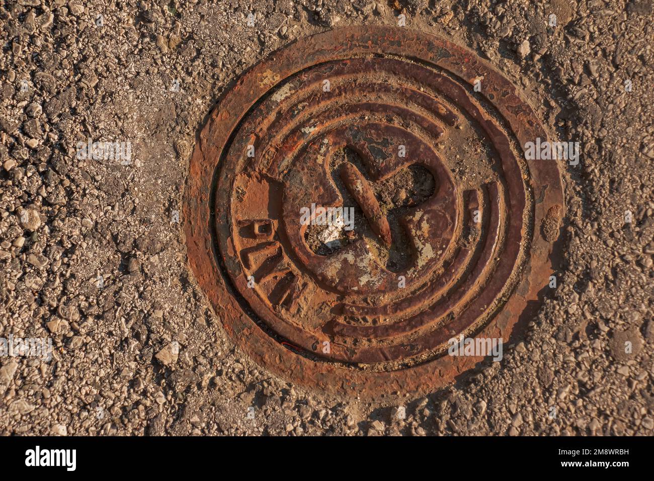 Manhole cover of the gas pipeline system. A massive metal hatch for ...
