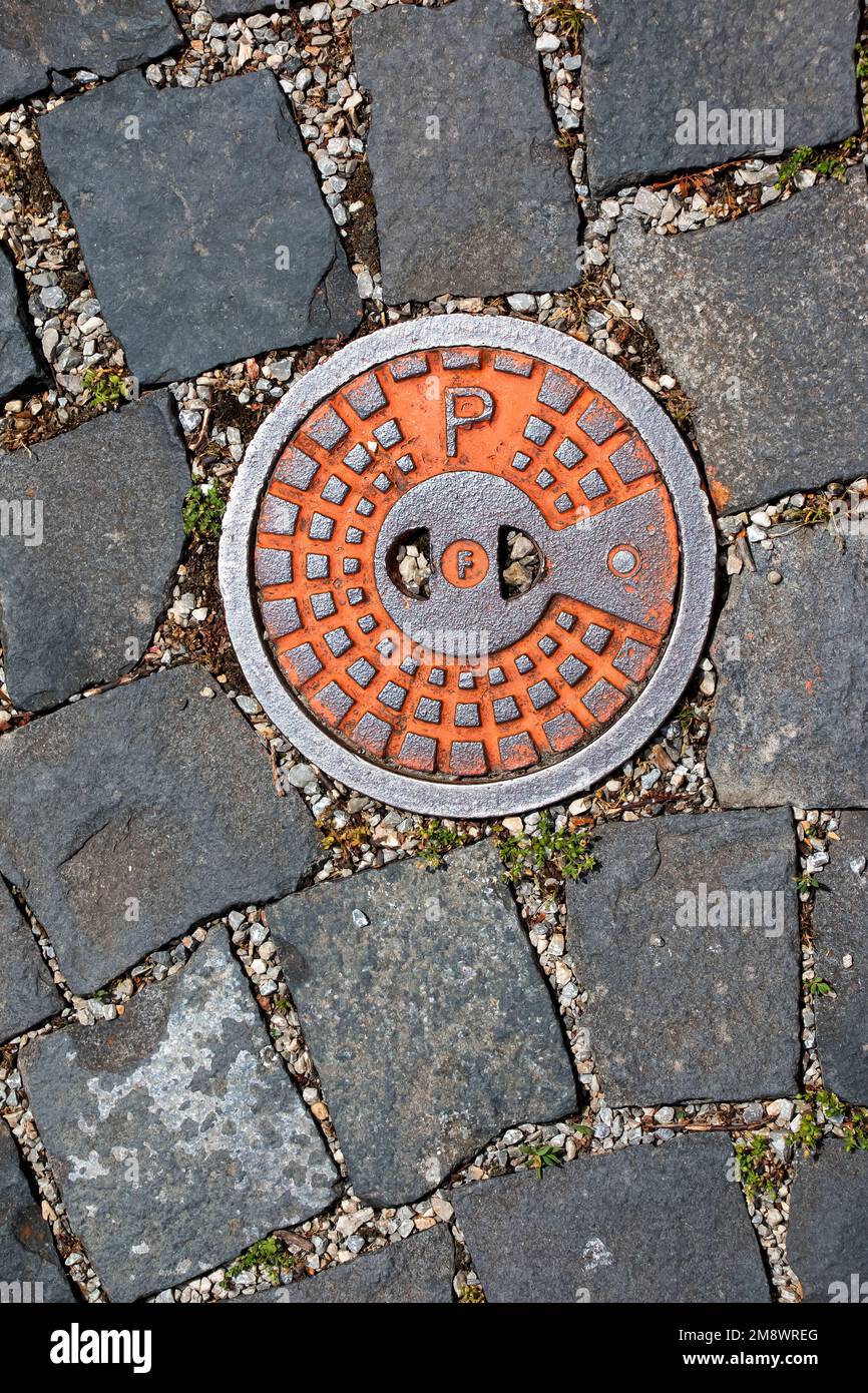 Manhole cover of the gas pipeline system. A massive metal hatch for ...