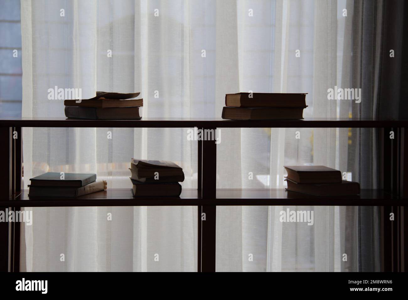 Poetry Books On A Wooden Shelf On Front Of Window Stock Photo - Alamy